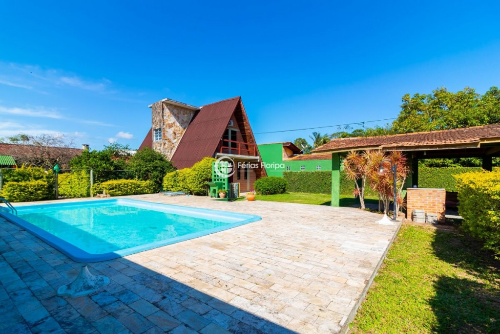 Casa Chalé Rústica Arborizada Com piscina e churrasqueira | Tripmood